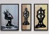 three paintings of women as chess pieces hung on the wall